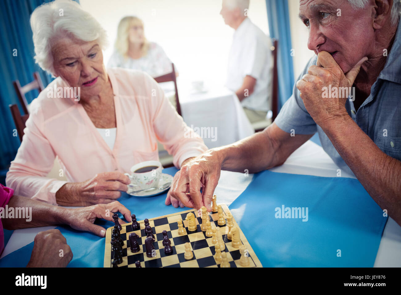 Seniors playing chess Stock Photo - Alamy