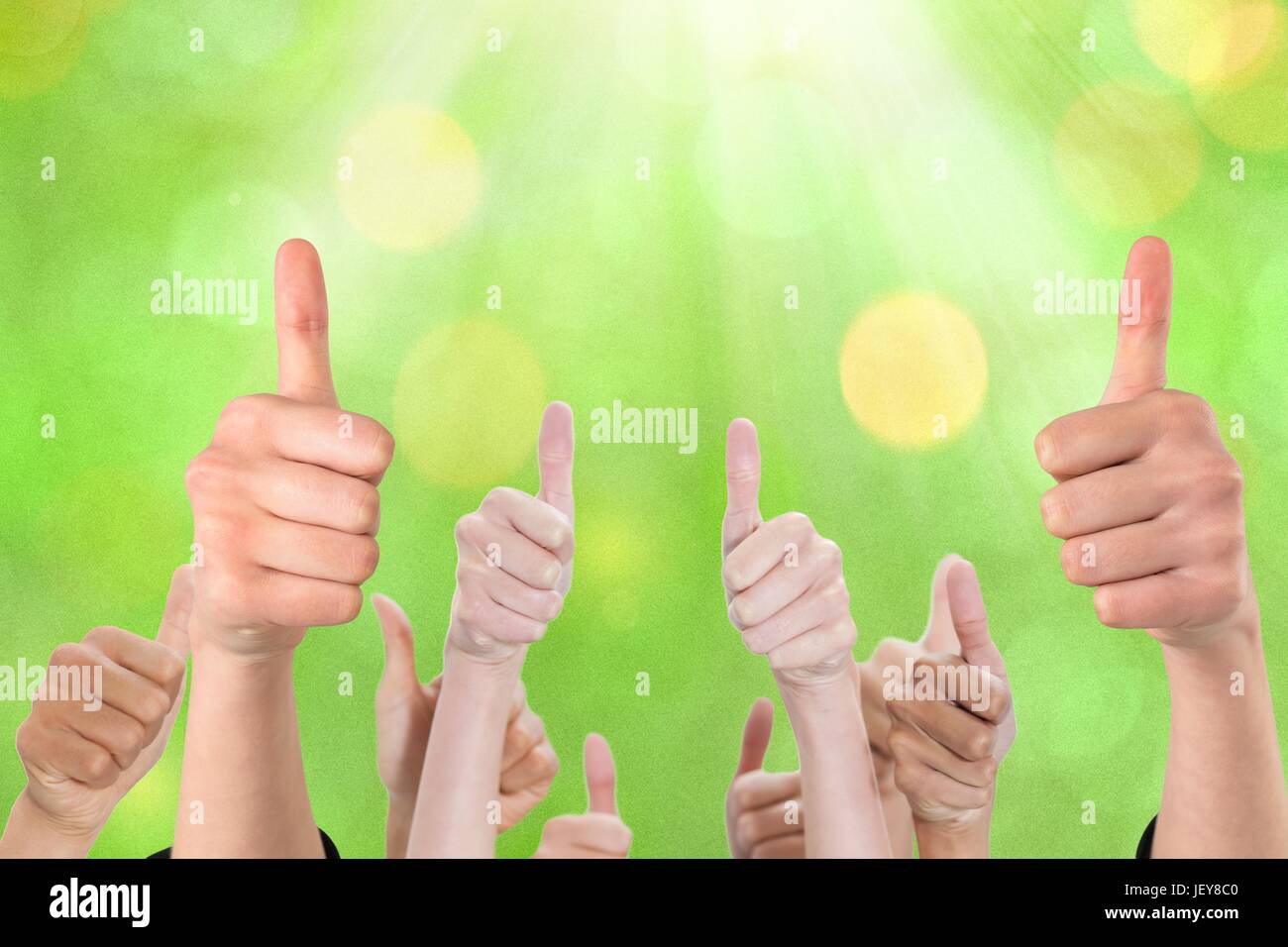 Composite image of thumbs up Stock Photo - Alamy