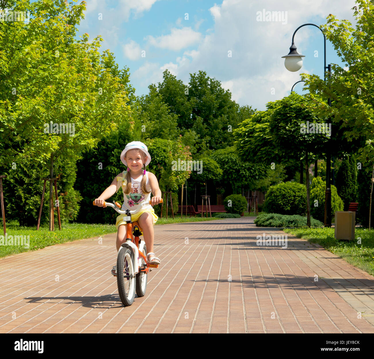 child riding a Bicycle in the Park Stock Photo - Alamy
