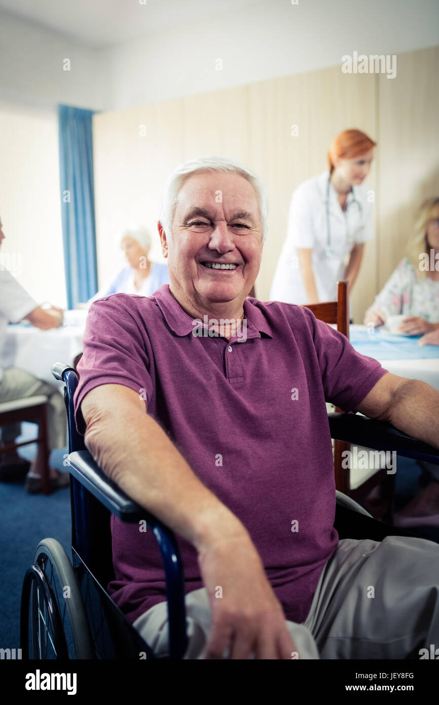 Portrait of a senior man in wheelchair Stock Photo - Alamy