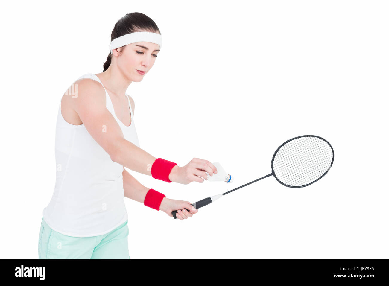 Female athlete playing badminton Stock Photo - Alamy