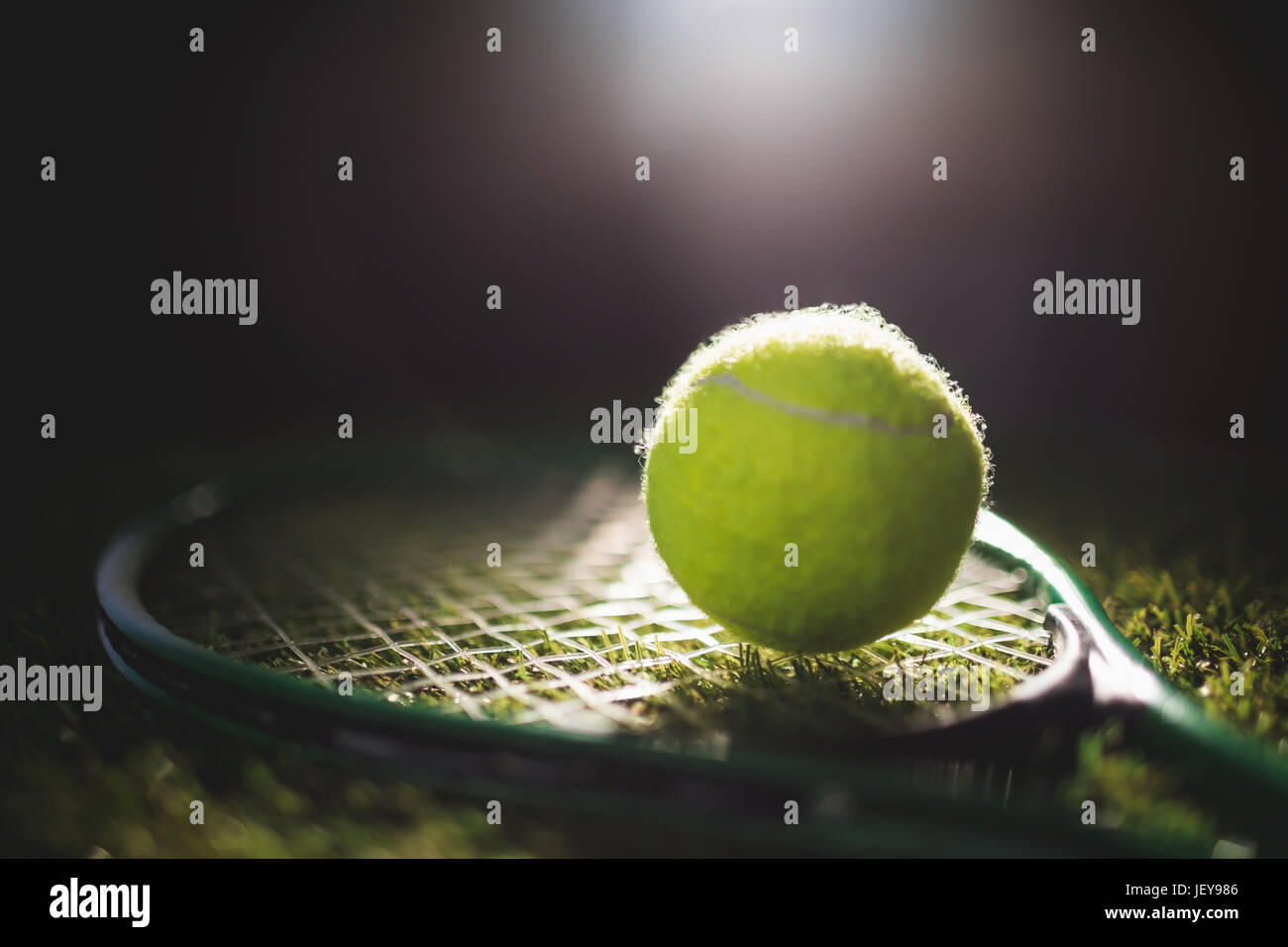 Tossing up tennis ball hi-res stock photography and images - Alamy