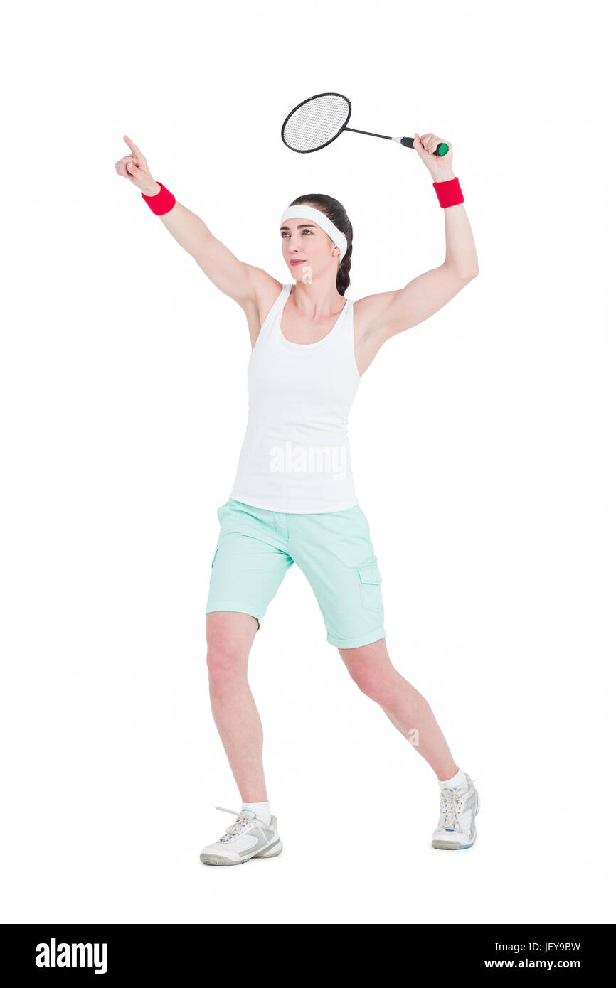 Female athlete playing badminton Stock Photo - Alamy