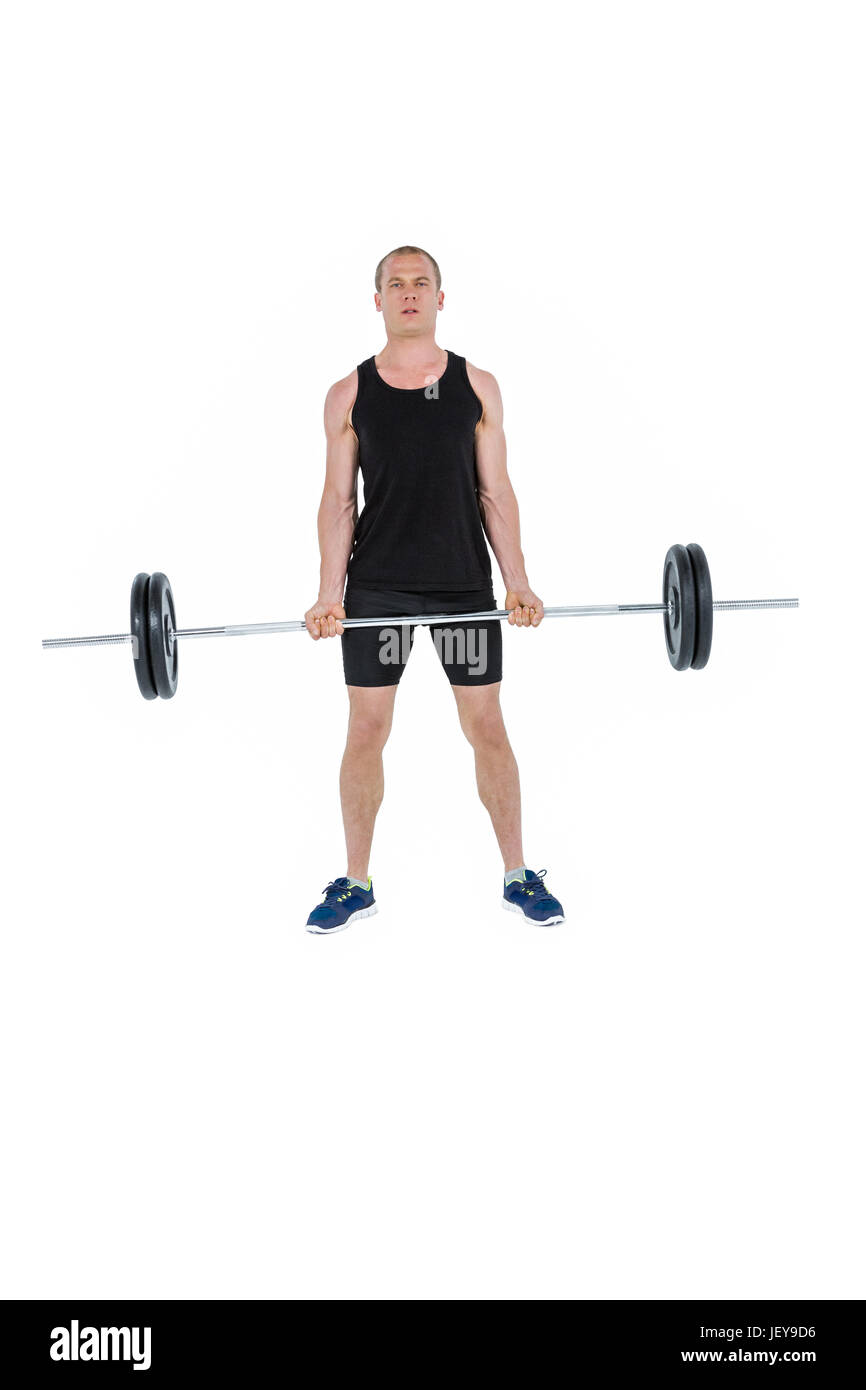 Bodybuilder lifting heavy barbell weights Stock Photo - Alamy