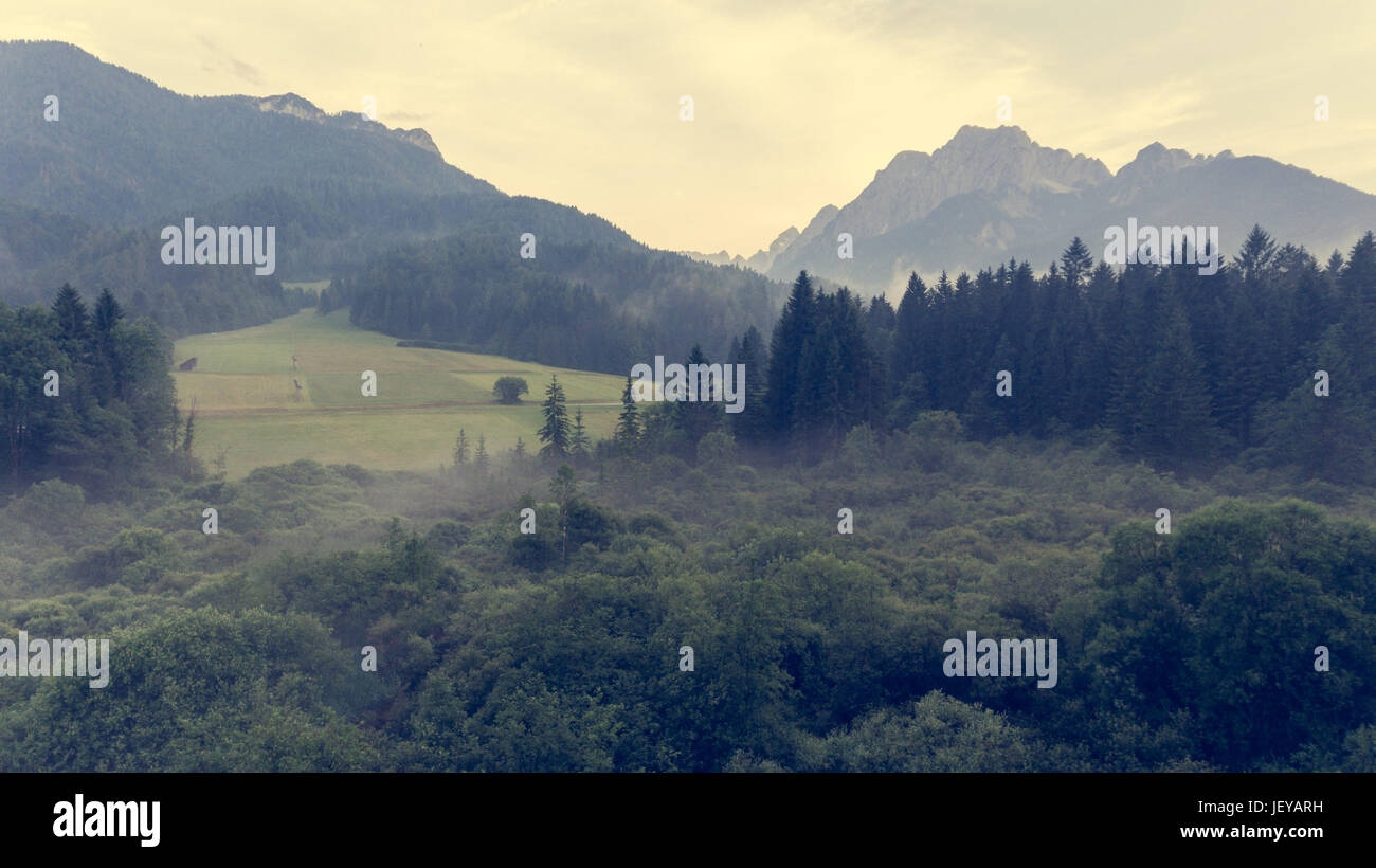 Aerial view of sunrise over a valley Stock Photo - Alamy