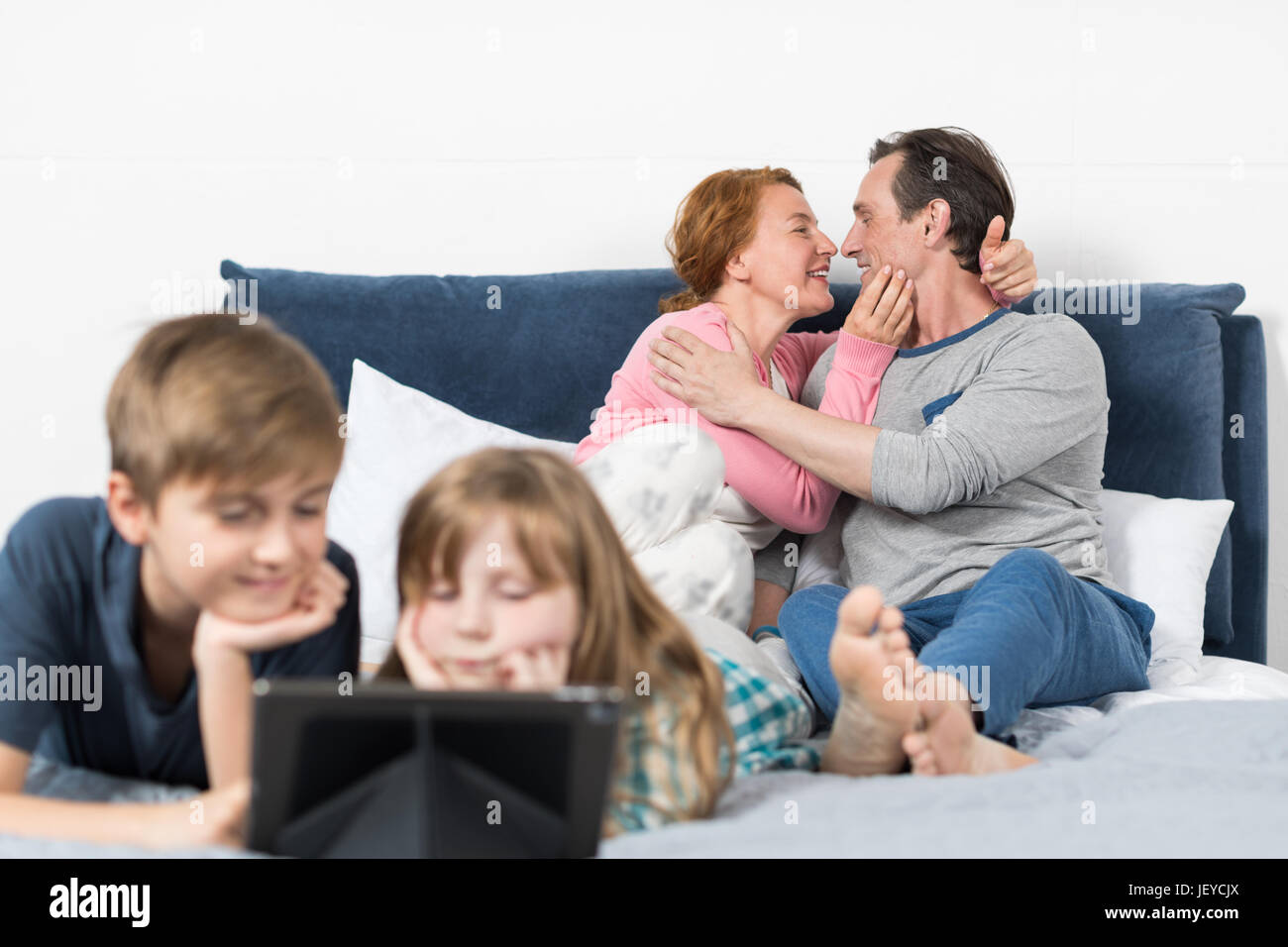 Father watching movies bed hi-res stock photography and images - Alamy