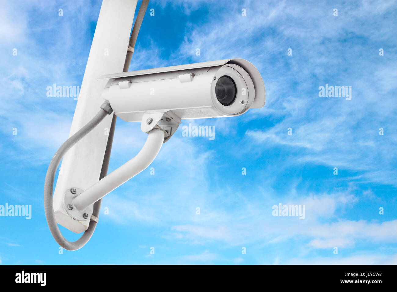 cctv camera with blue sky background Stock Photo - Alamy
