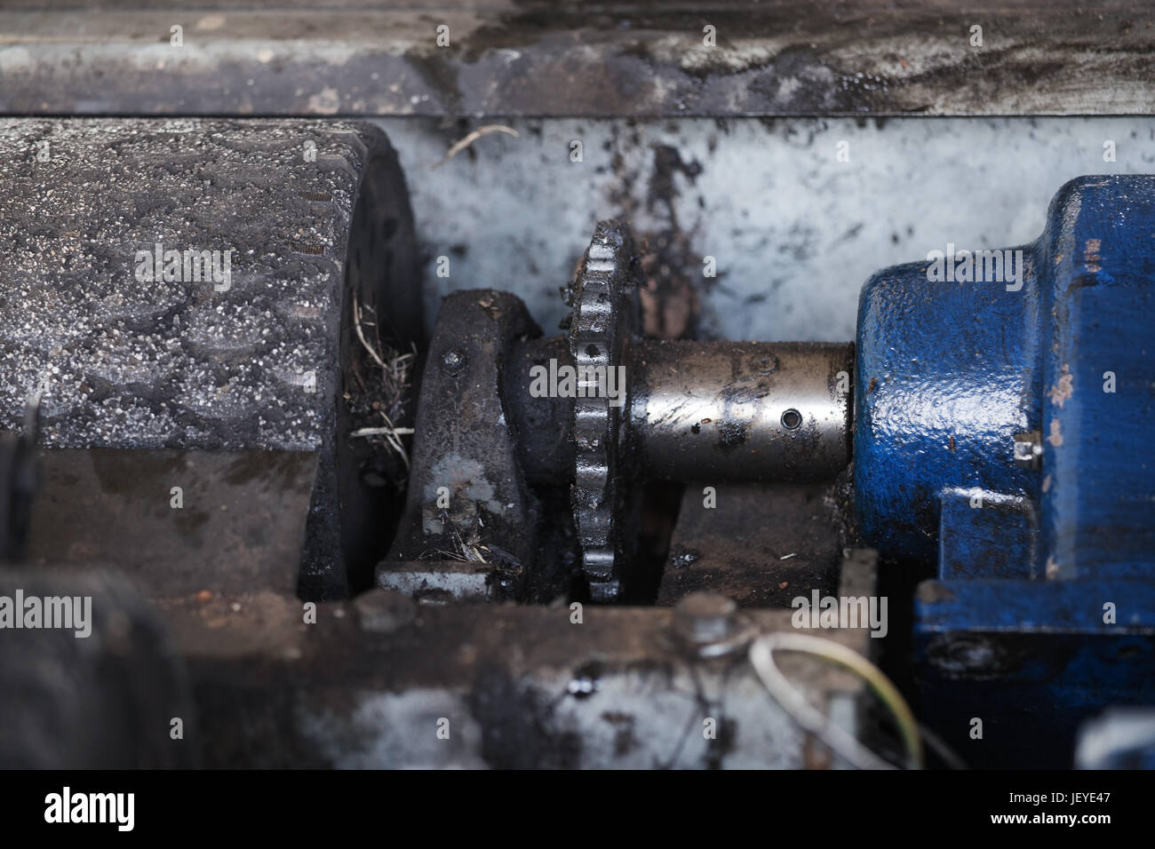 gear of chain with electric motor and roller of machine Stock Photo - Alamy