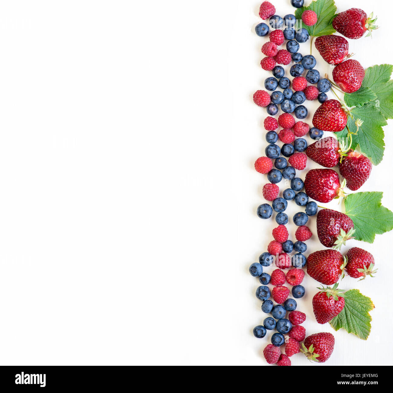 Various fresh summer berries. Top view Stock Photo - Alamy