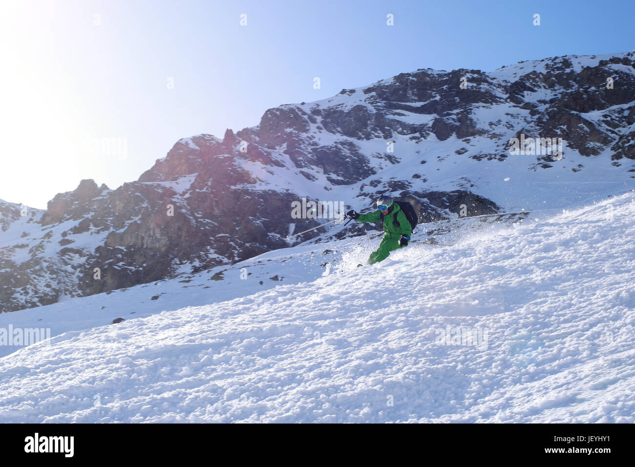 male is skiing in fresh powder Stock Photo - Alamy