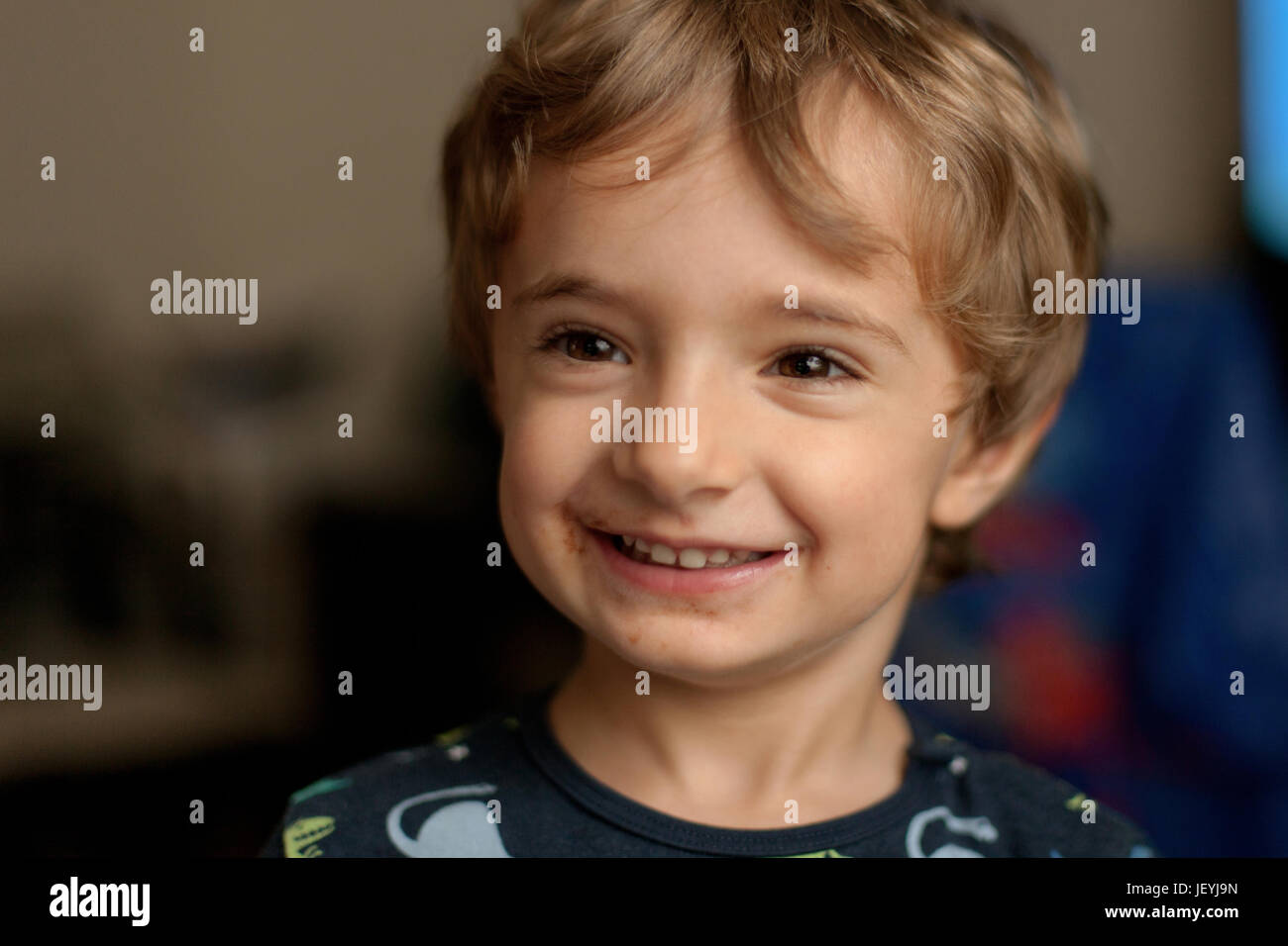 Portrait of a funny child at home smiling Stock Photo - Alamy