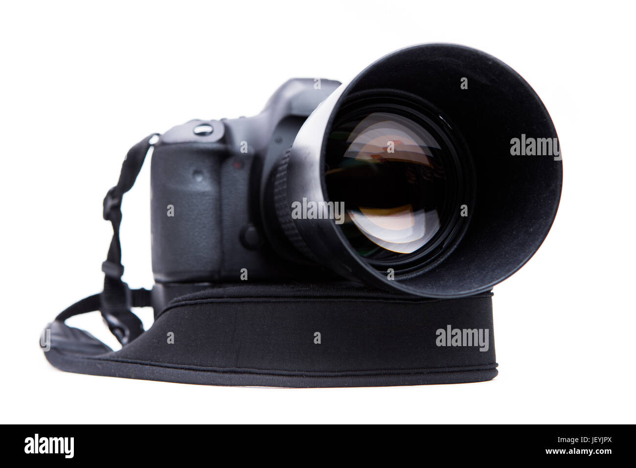 Photo of camera on blank white background Stock Photo - Alamy