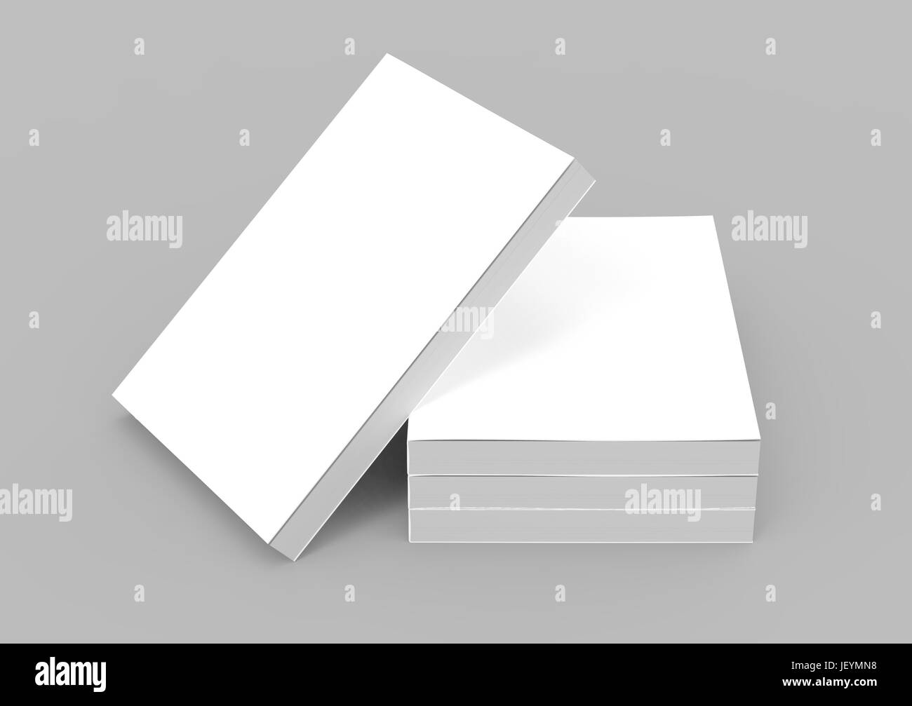 three books placed on ground and a left tilt book leaning on them ...