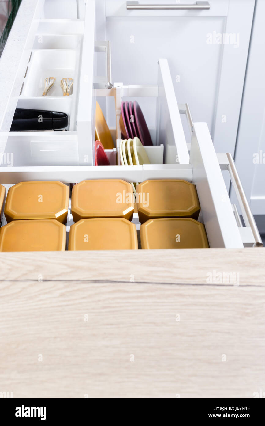 Detailed side view of a kitchen drawers. Diviers onside of the drawer ...