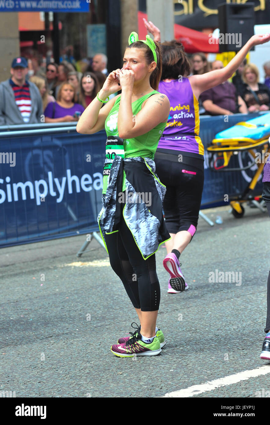 runner are seen finishing the great Manchester run, despite the ...