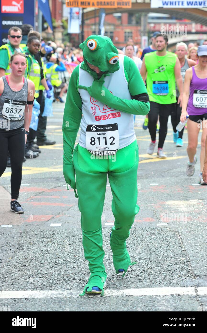 runner are seen finishing the great Manchester run, despite the ...