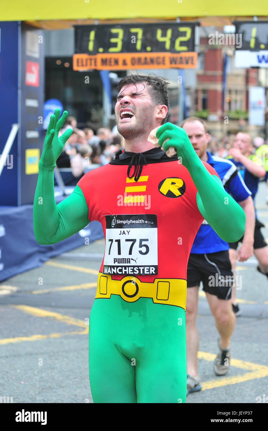 runner are seen finishing the great Manchester run, despite the ...