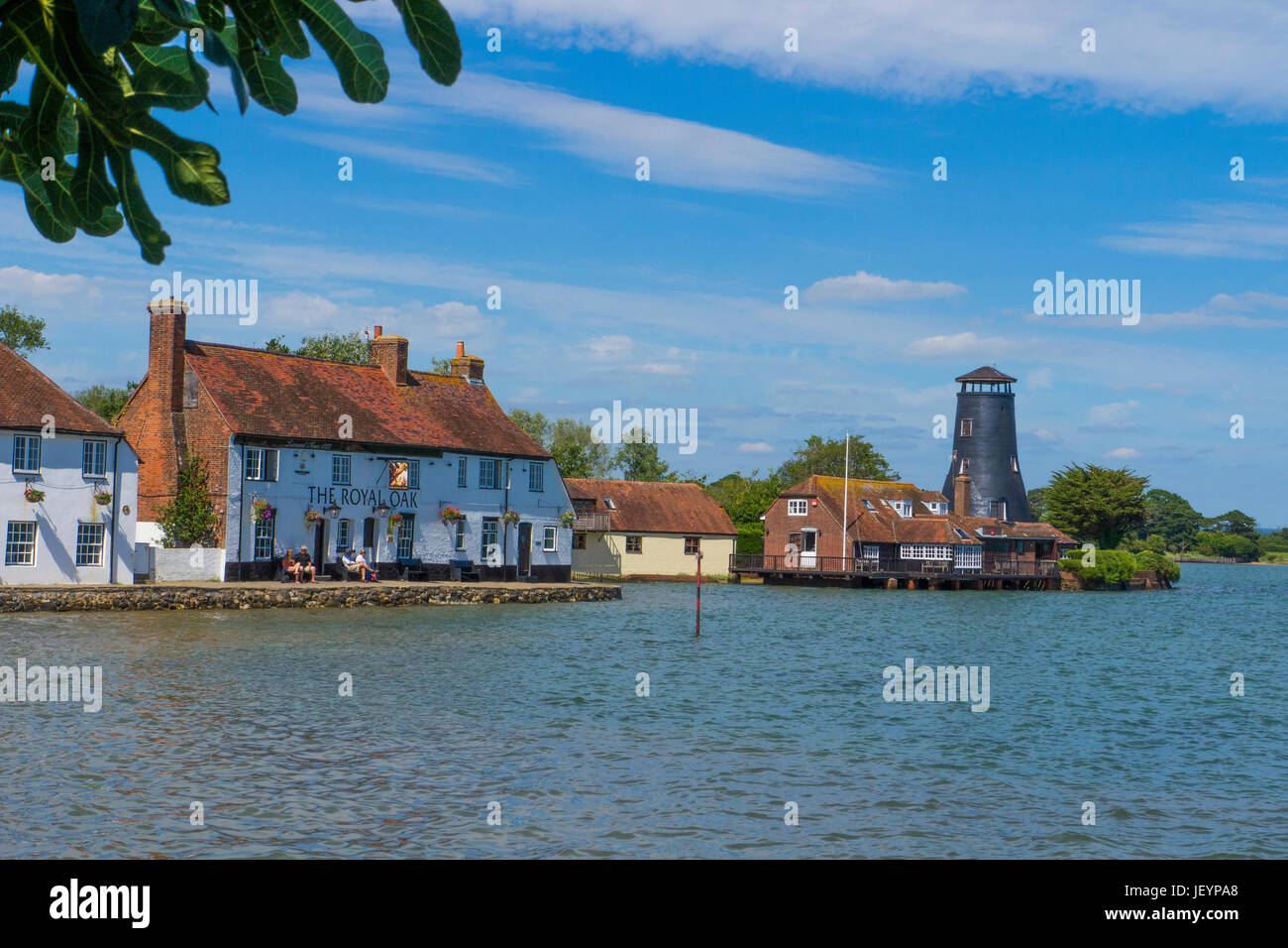 The Royal Oak pub and Langstone Mill at High TIde .Langston Harbour ...