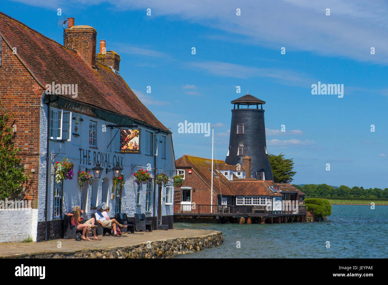 The Royal Oak pub and Langstone Mill at High TIde .Langston Harbour ...