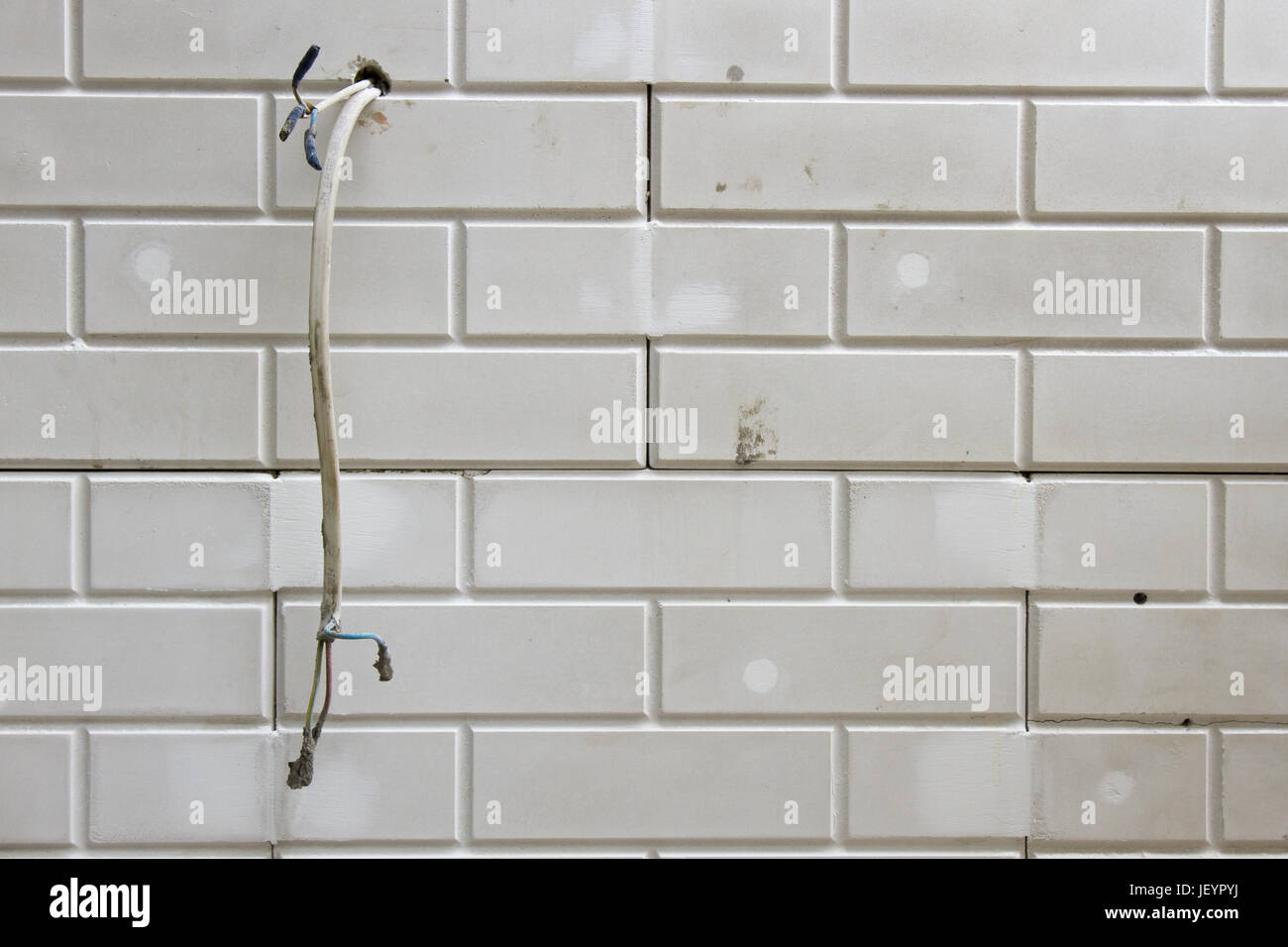 Pipe wall, air duct or pipe wires on the wall Stock Photo - Alamy