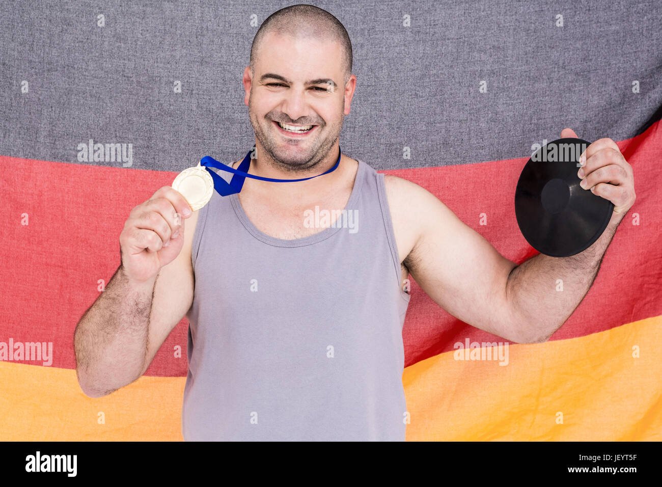 Athlete with olympic gold medal Stock Photo - Alamy