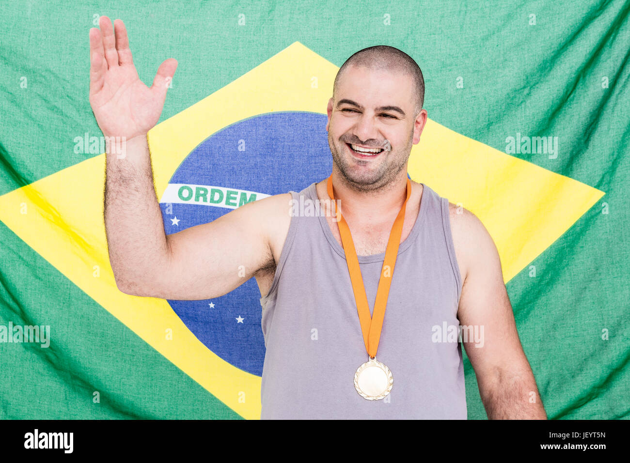 Athlete with olympic gold medal Stock Photo - Alamy