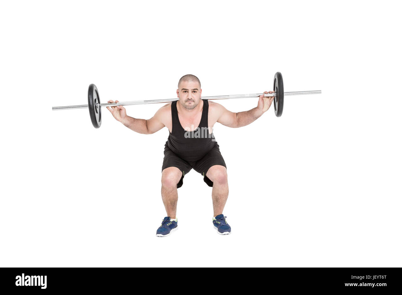 Bodybuilder lifting heavy barbell weights Stock Photo - Alamy