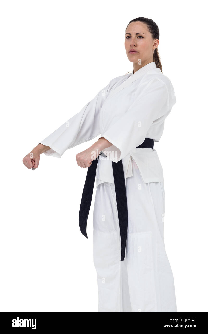 Female fighter performing karate stance Stock Photo - Alamy