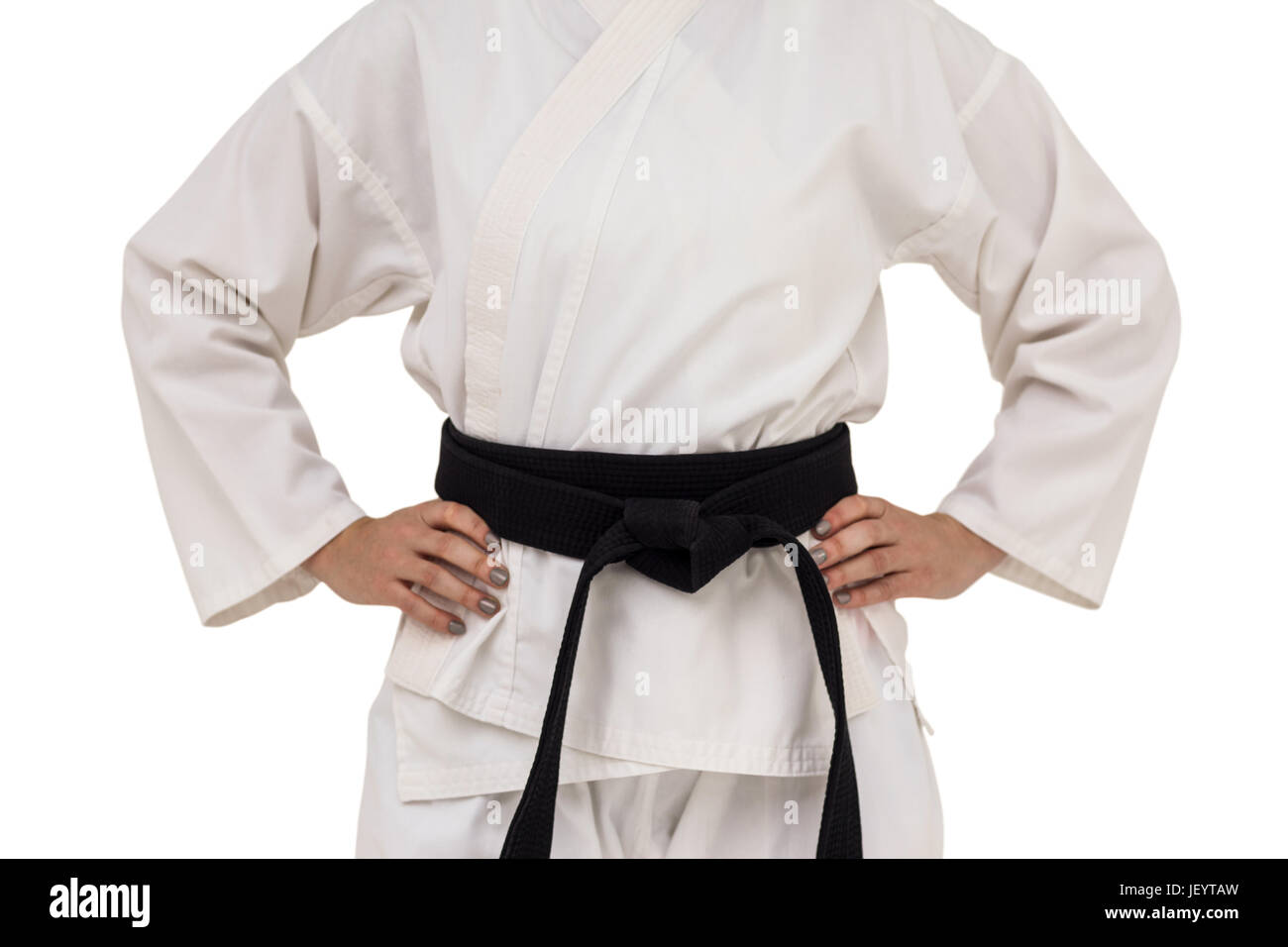 Female fighter standing with hand on hip Stock Photo - Alamy