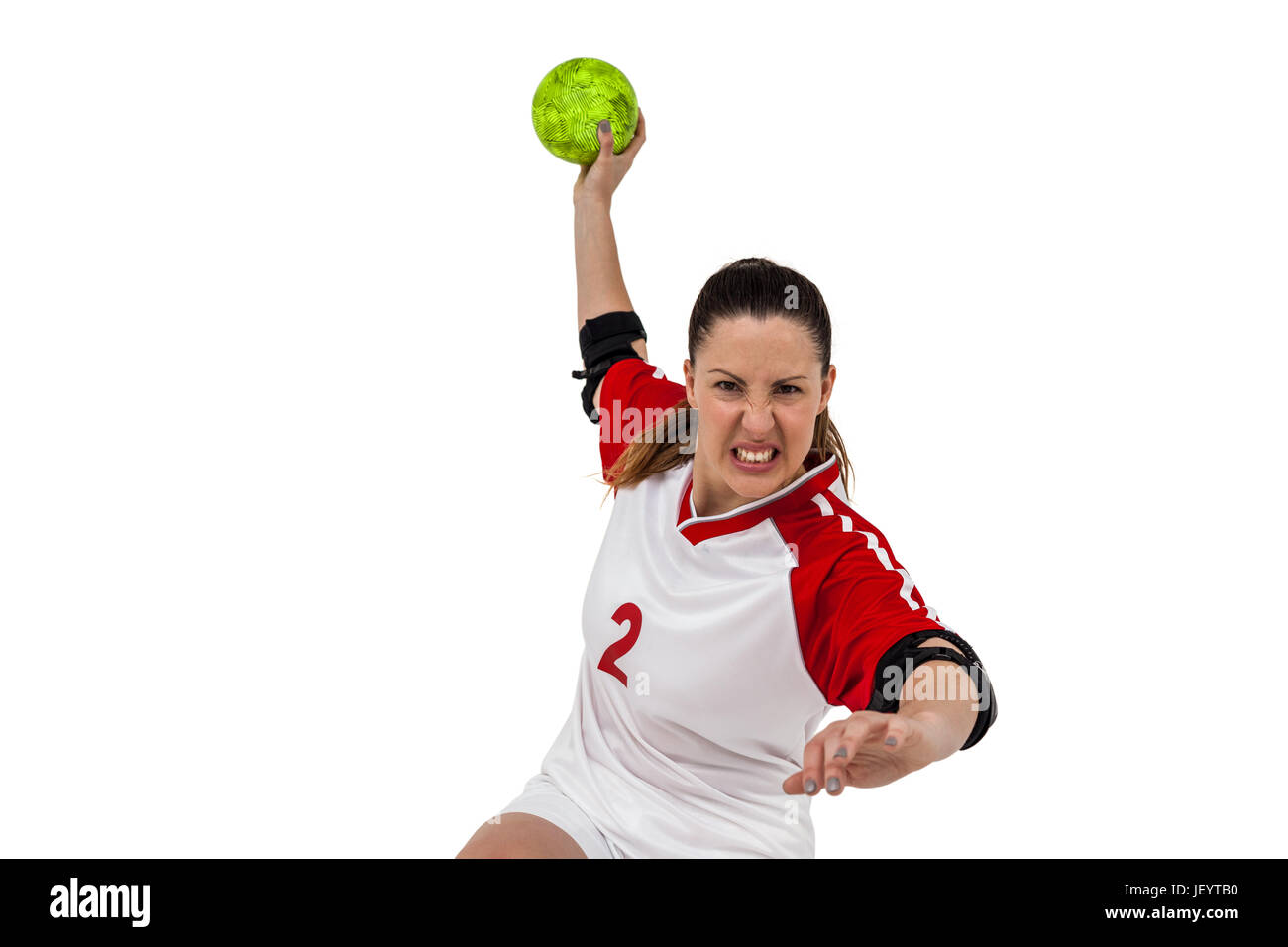 Sportswoman throwing a ball Stock Photo - Alamy