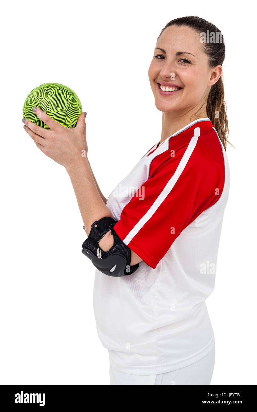 Sportswoman posing with ball Stock Photo - Alamy