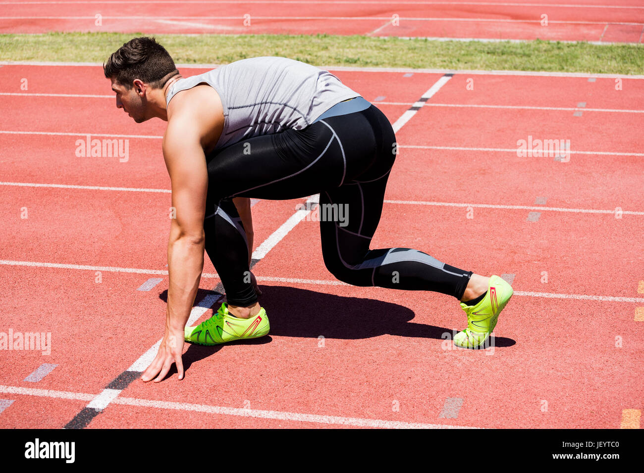 Athlete ready to run Stock Photo - Alamy