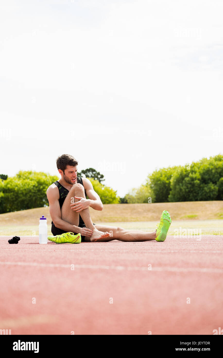 Male athlete on a running track hi-res stock photography and images - Alamy
