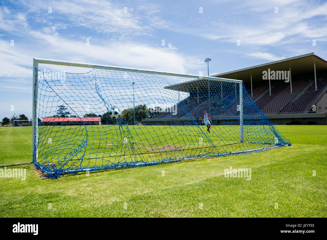 Football hitting the back of net Stock Photo - Alamy