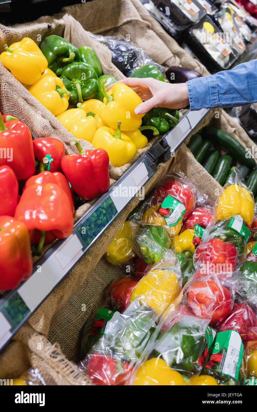 Customer picking red pepper hi-res stock photography and images - Alamy