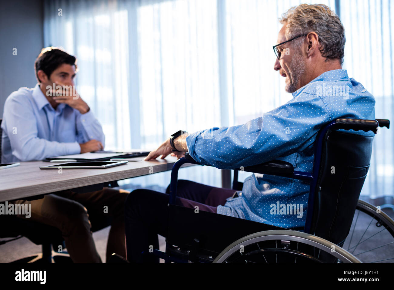 Two businessmen interacting Stock Photo - Alamy