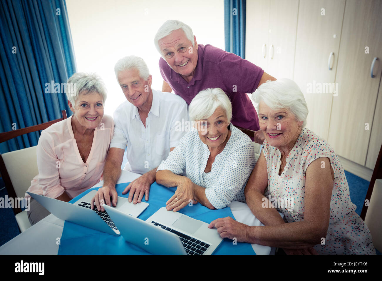 Group of seniors using a computer Stock Photo - Alamy