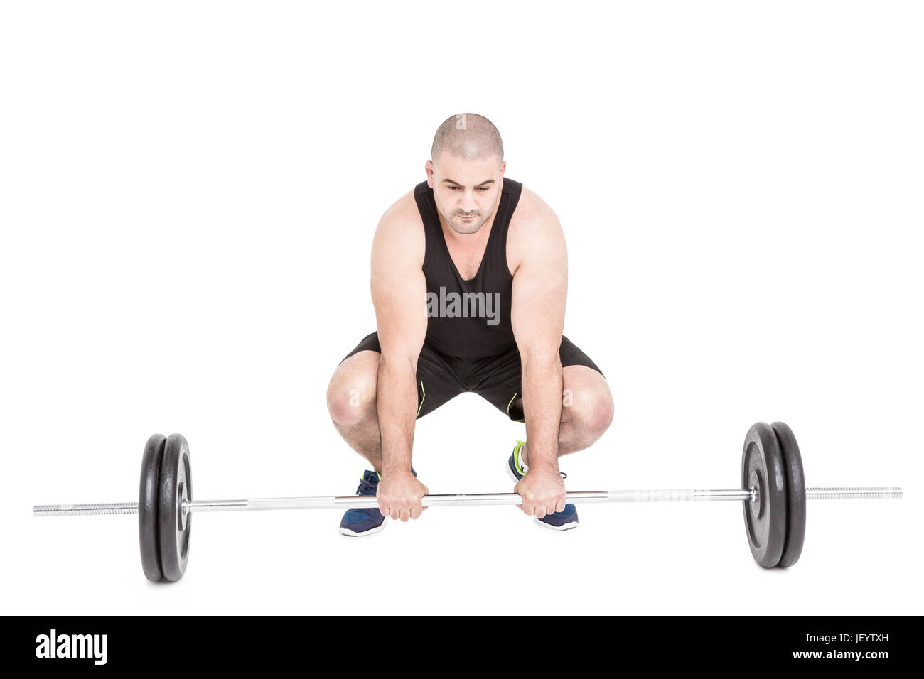 Bodybuilder lifting heavy barbell weights Stock Photo - Alamy