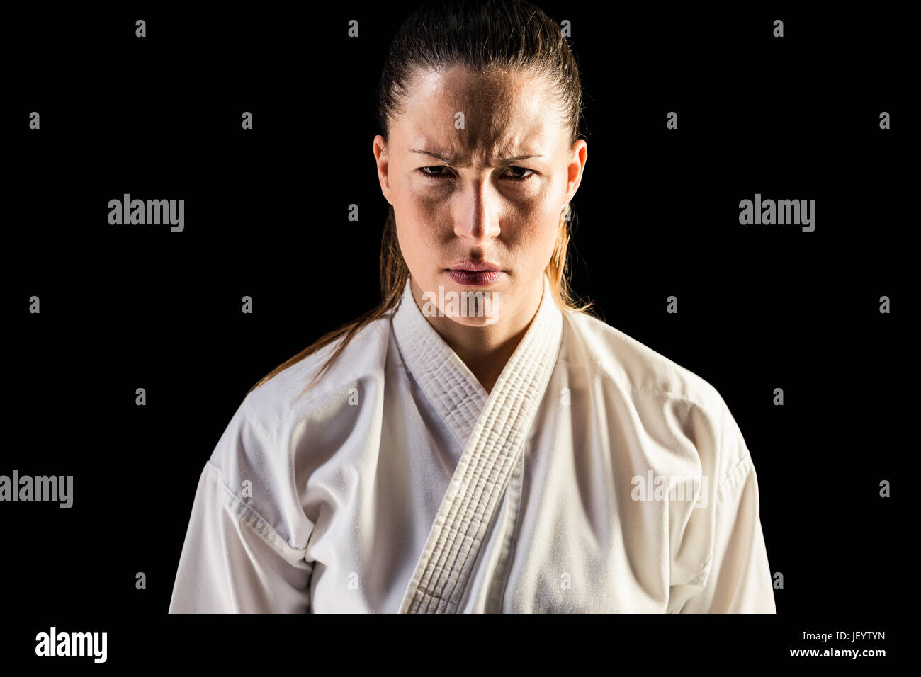 Female fighter on black background Stock Photo - Alamy