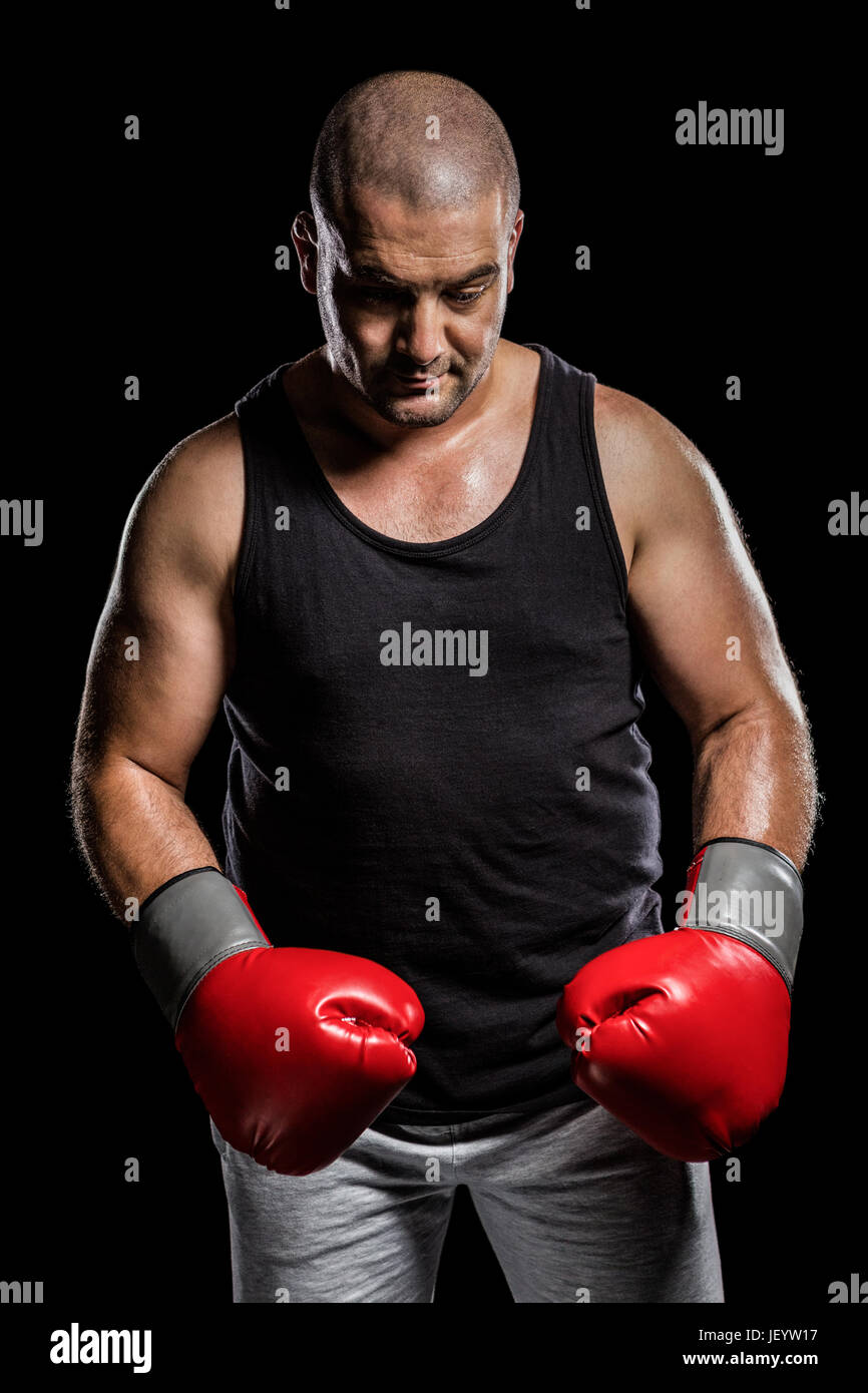 Boxer posing after failure Stock Photo - Alamy