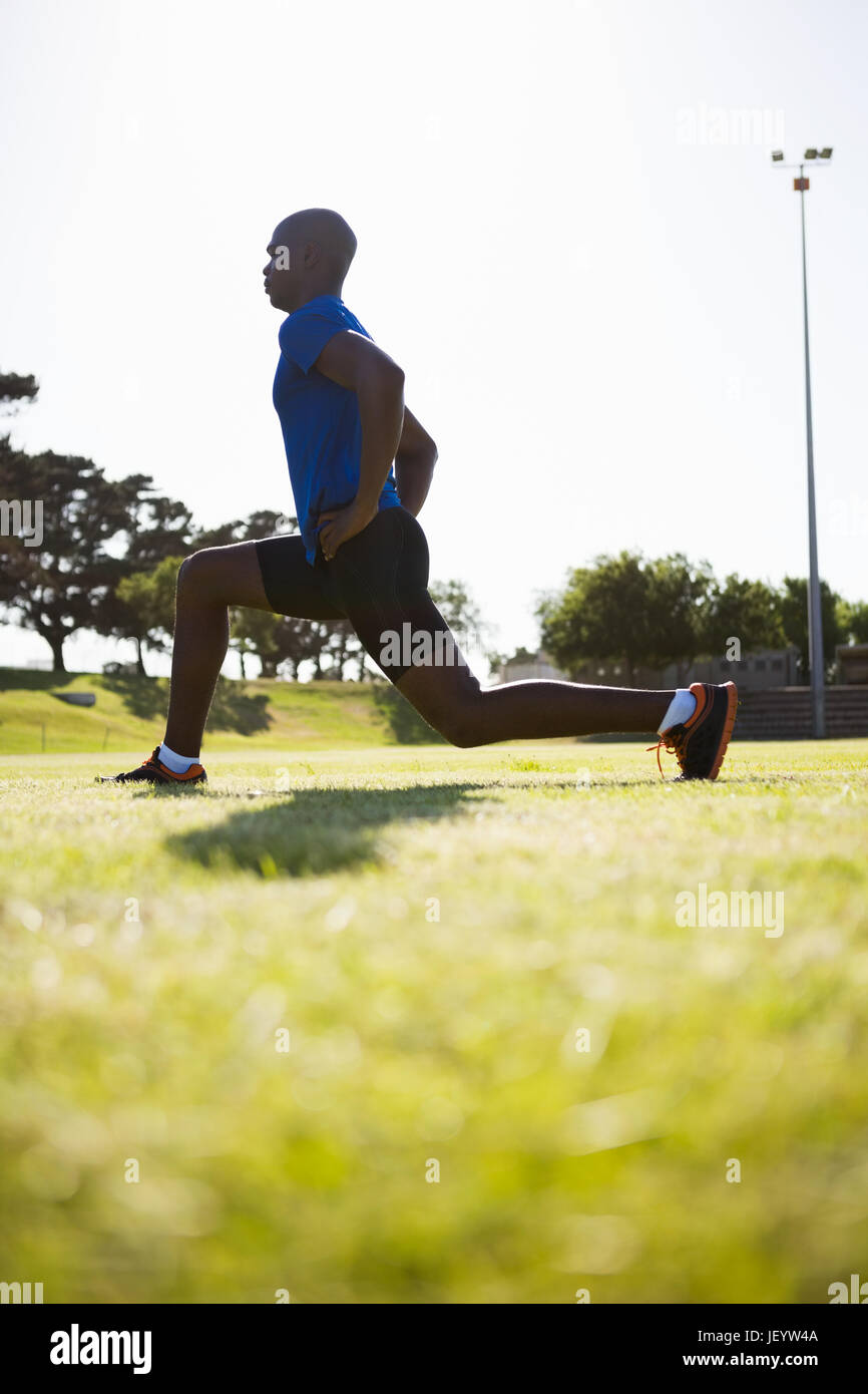 Athlete warming up in a stadium Stock Photo - Alamy