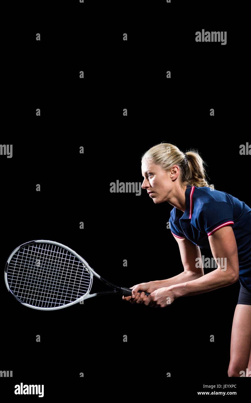 Tennis player playing tennis with a racket Stock Photo - Alamy
