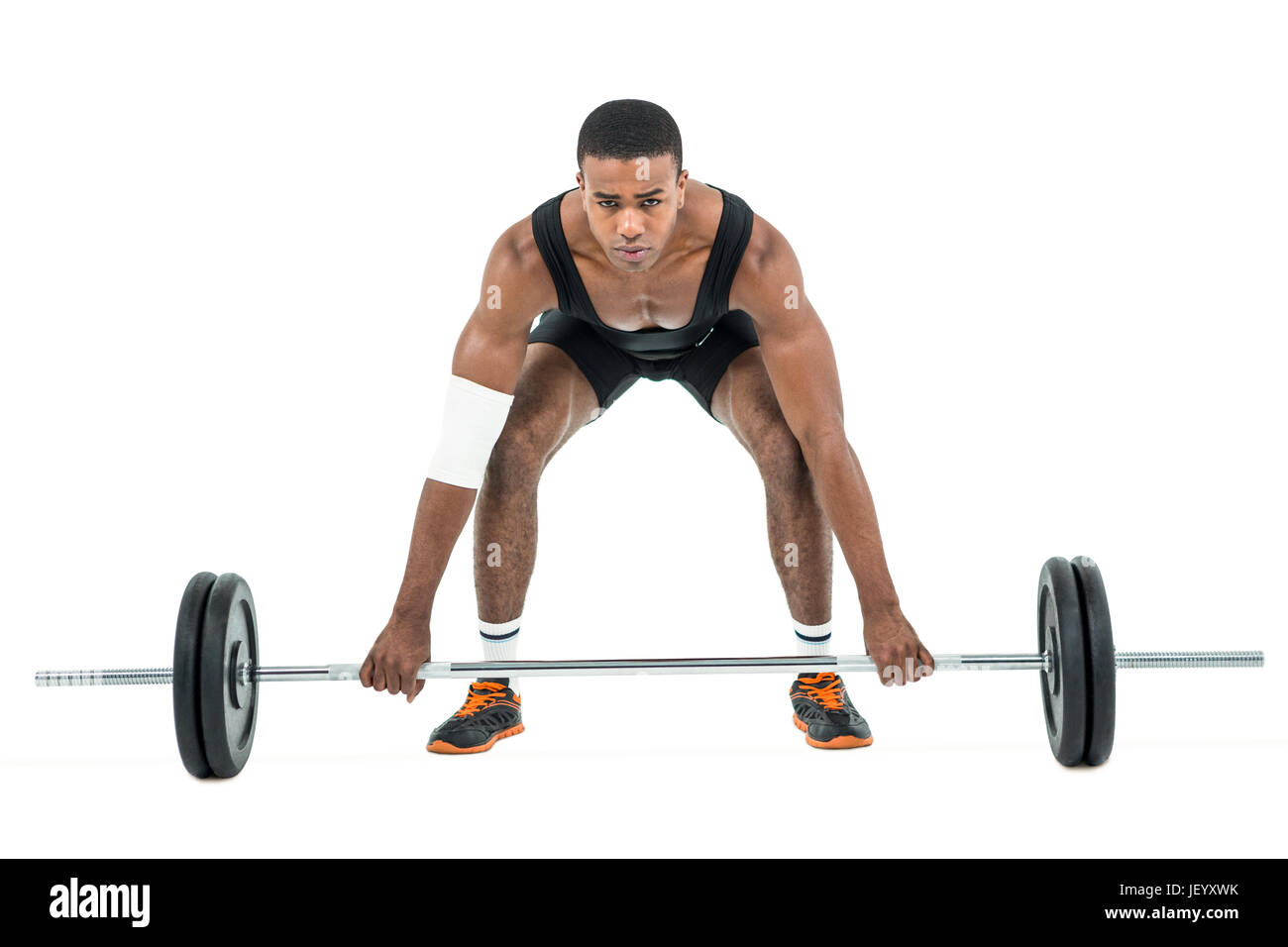 Bodybuilder lifting heavy barbell weights Stock Photo - Alamy