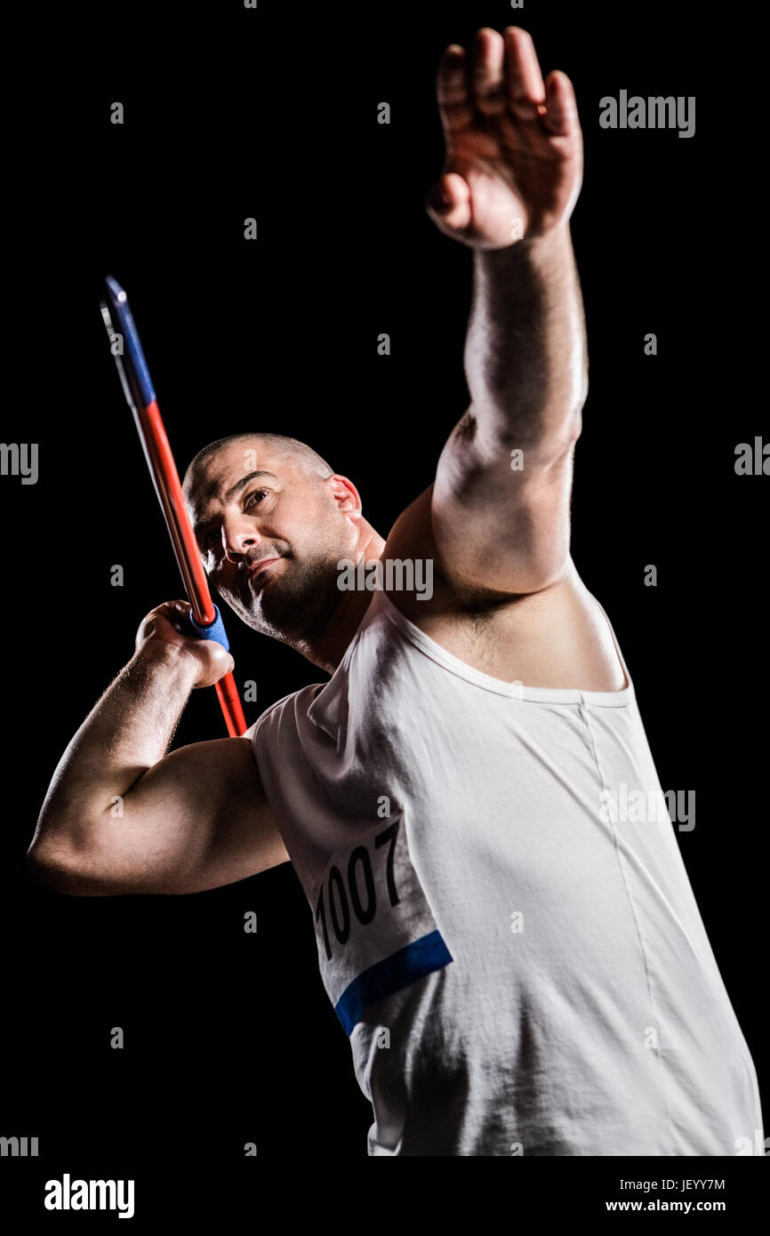 Athlete preparing to throw javelin Stock Photo - Alamy