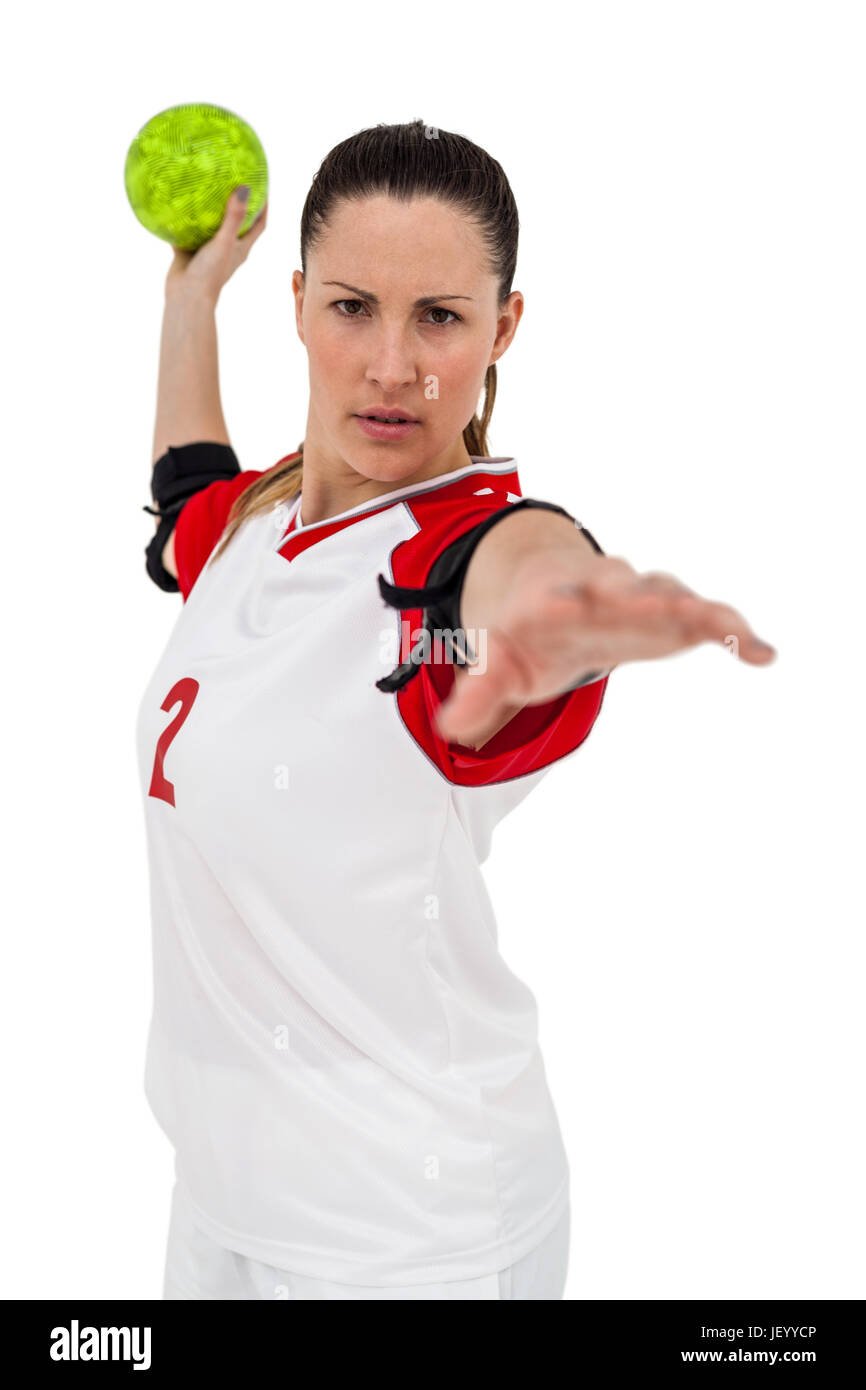 Sportswoman throwing a ball Stock Photo - Alamy