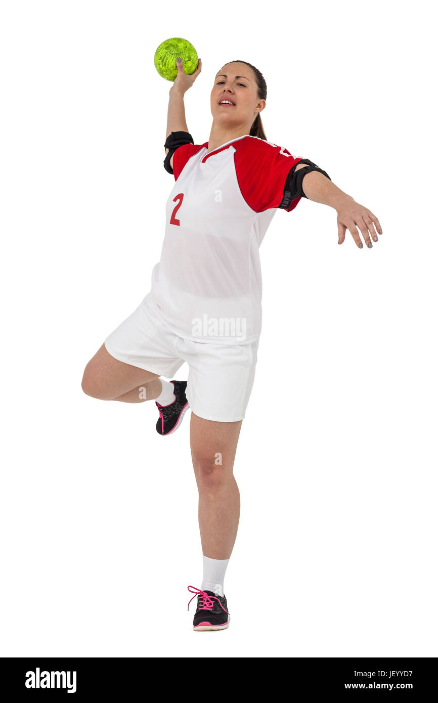 Sportswoman throwing a ball Stock Photo - Alamy