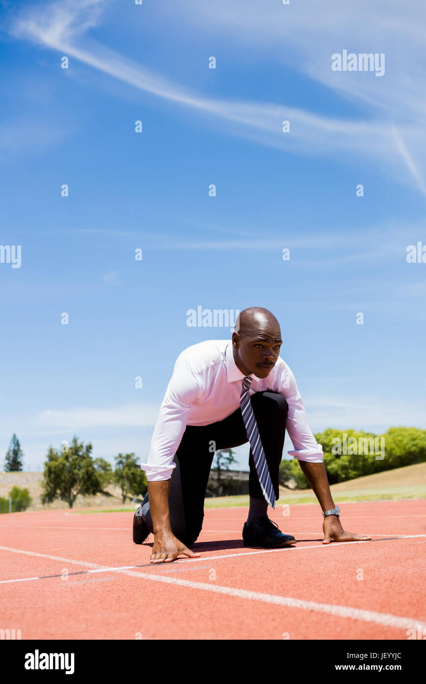 Businessman ready to run Stock Photo - Alamy Businessman ready to run Stock Photo - Alamy