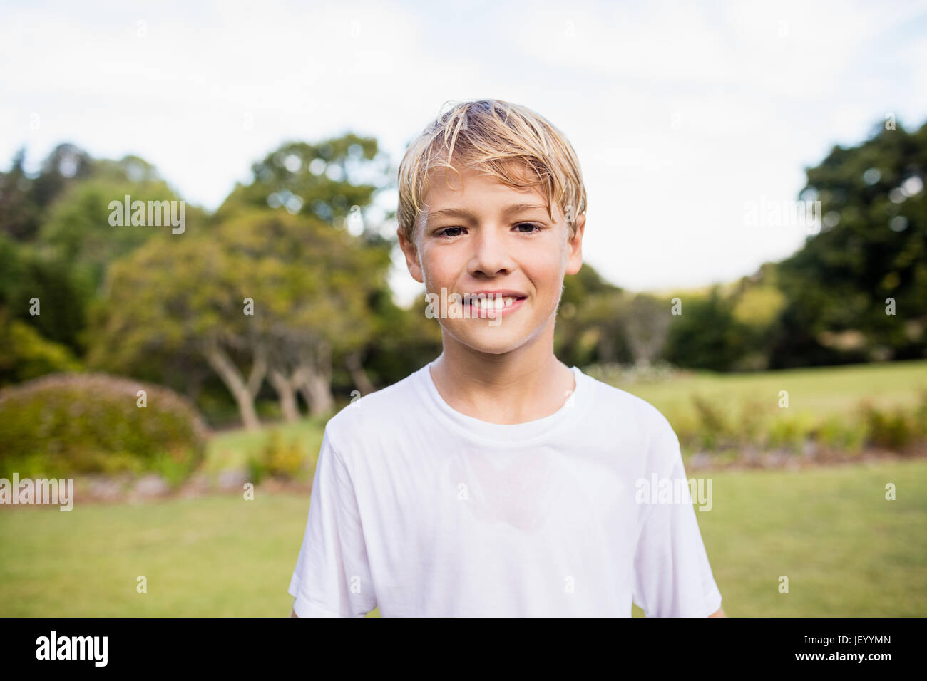 Kid posing at camera during a sunny day Stock Photo - Alamy