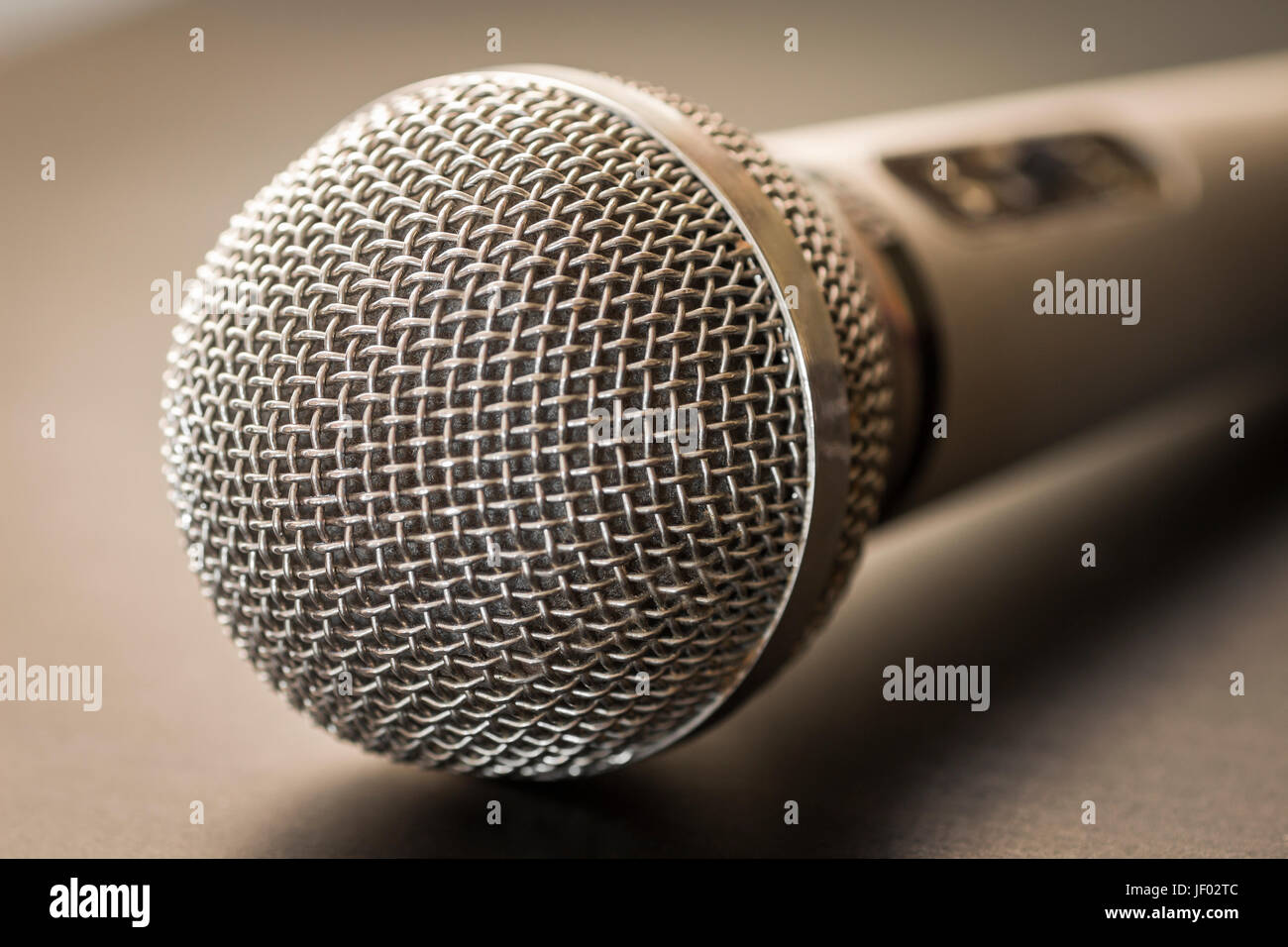 Studio microphone lying on the table close-up Stock Photo - Alamy