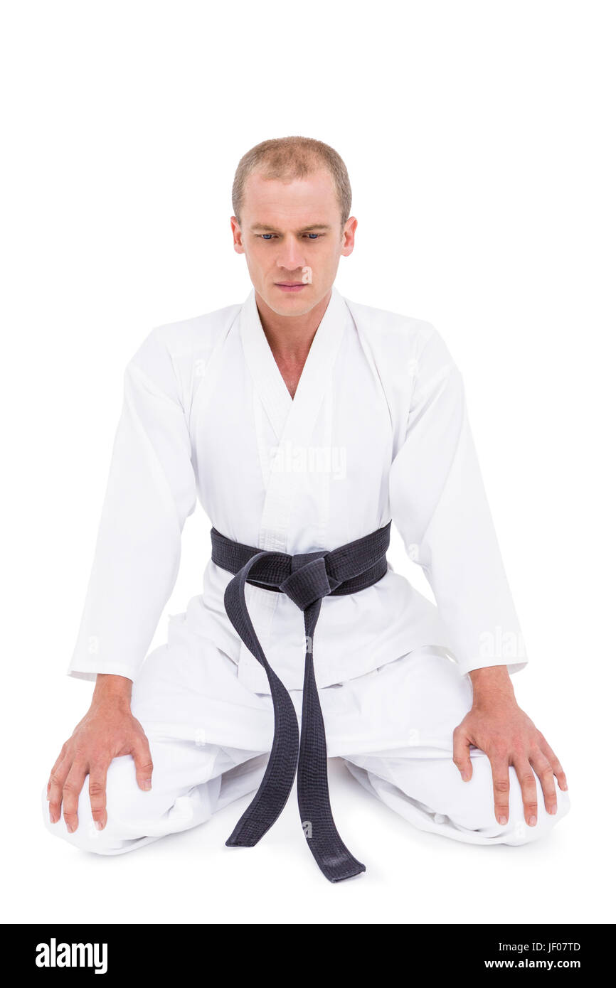 Front view of karate fighter meditating Stock Photo - Alamy